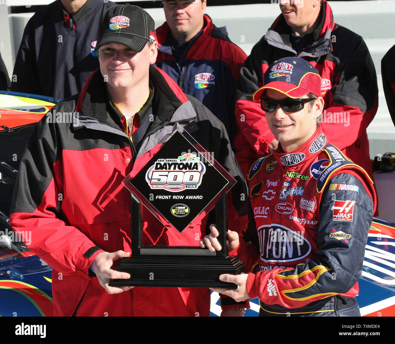 Jeff Gordon and his crew chief celebrate winning the front row award ...