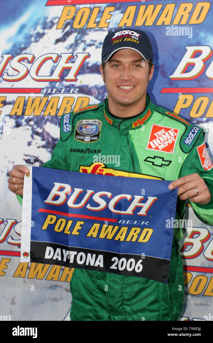J.J. Yeley celebrates with his Bud Pole award for qualifying his Busch ...