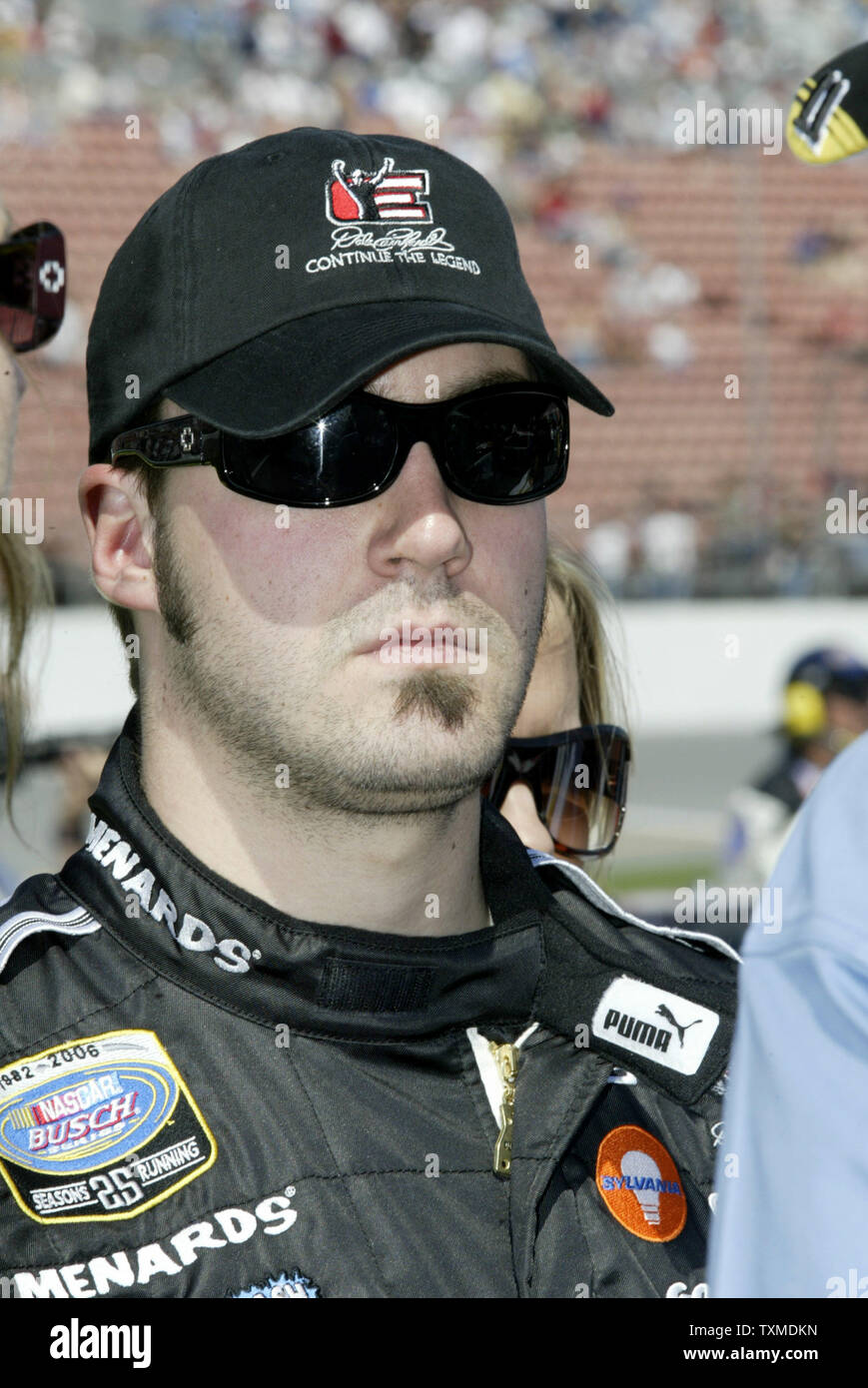 Paul Menard waits by his car for the start of the NASCAR Hershey's ...