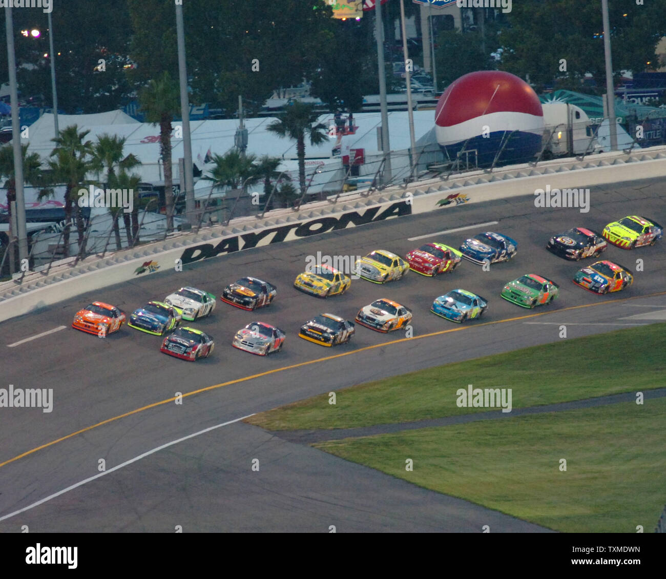 The field of cars runs through turn 4 during the 48th annual NASCAR ...
