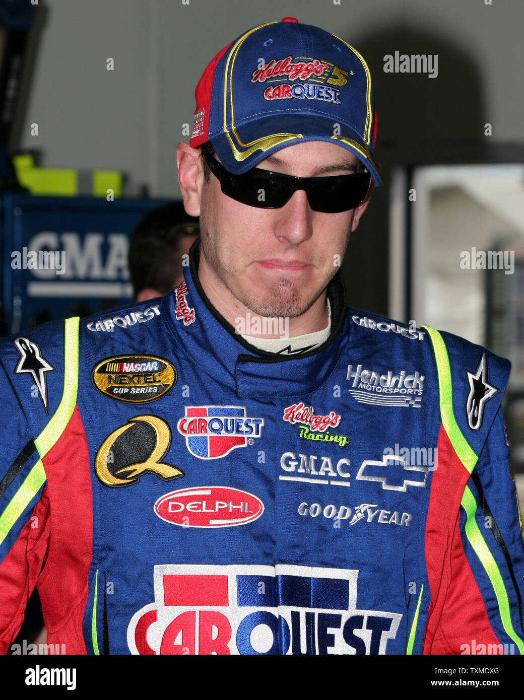 Kyle Busch waits in his garage for the afternoon Daytona 500 practice ...