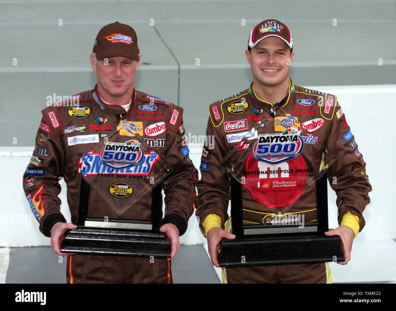 David Gilliland(R) and teammate Ricky Rudd celebrate winning the front ...