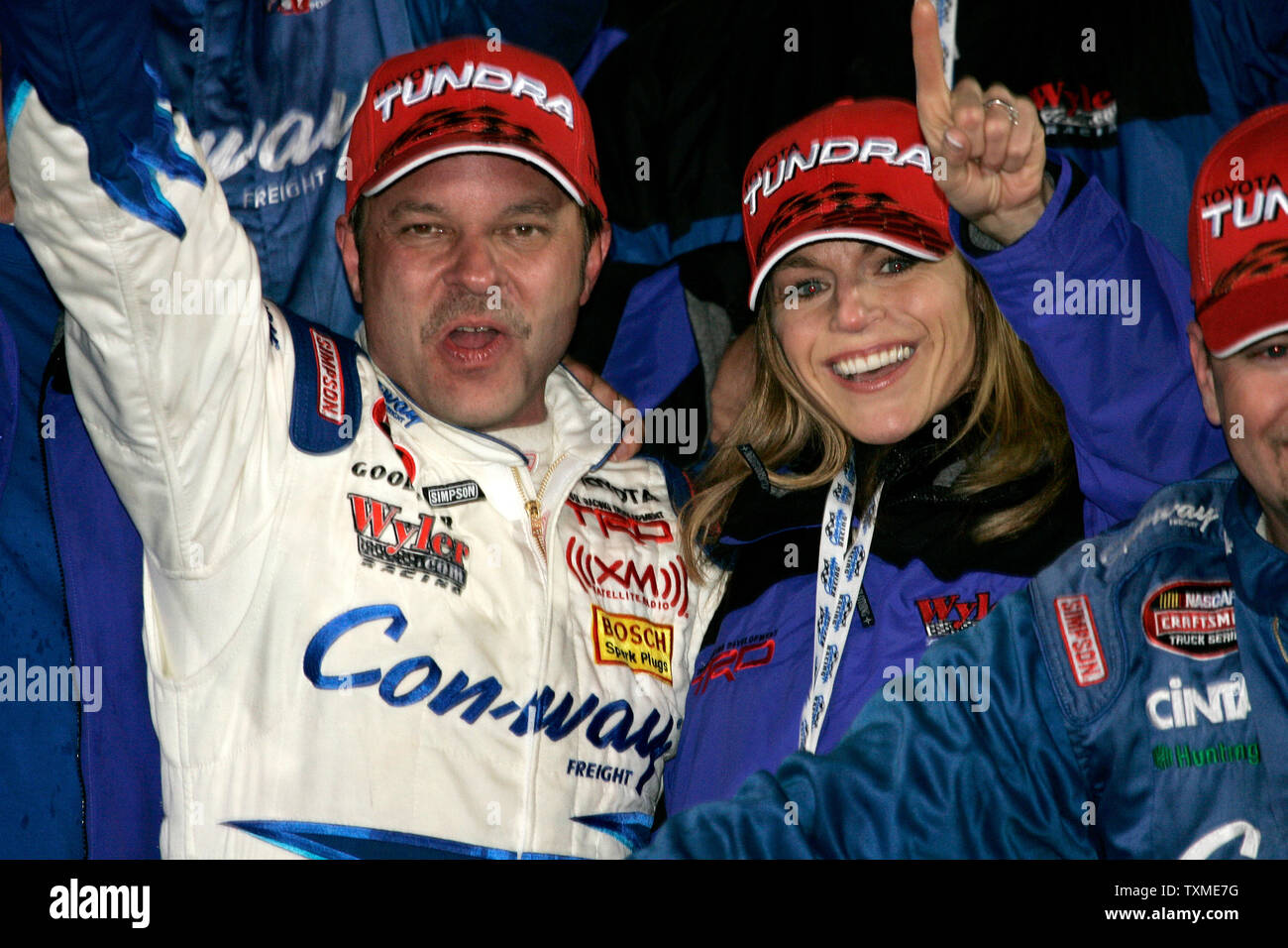 Jack Sprague and his fiancee Amy Schellenbach celebrate winning the ...