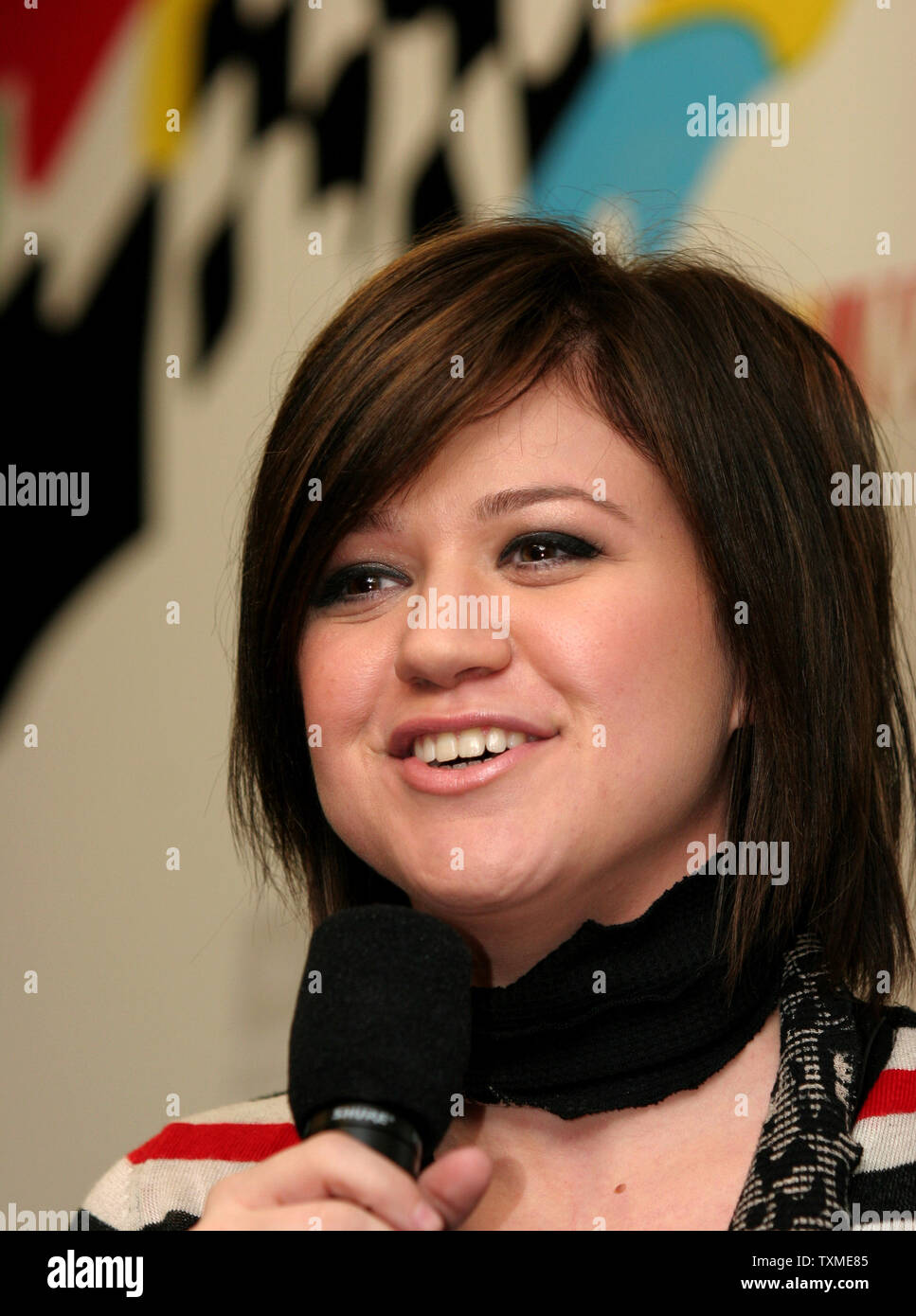 Kelly Clarkson speaks at a press conference at Daytona International ...