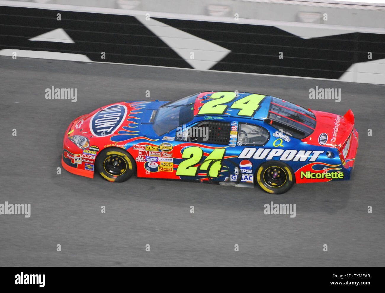 Jeff Gordon runs through turn one during the 49th Daytona 500, at ...