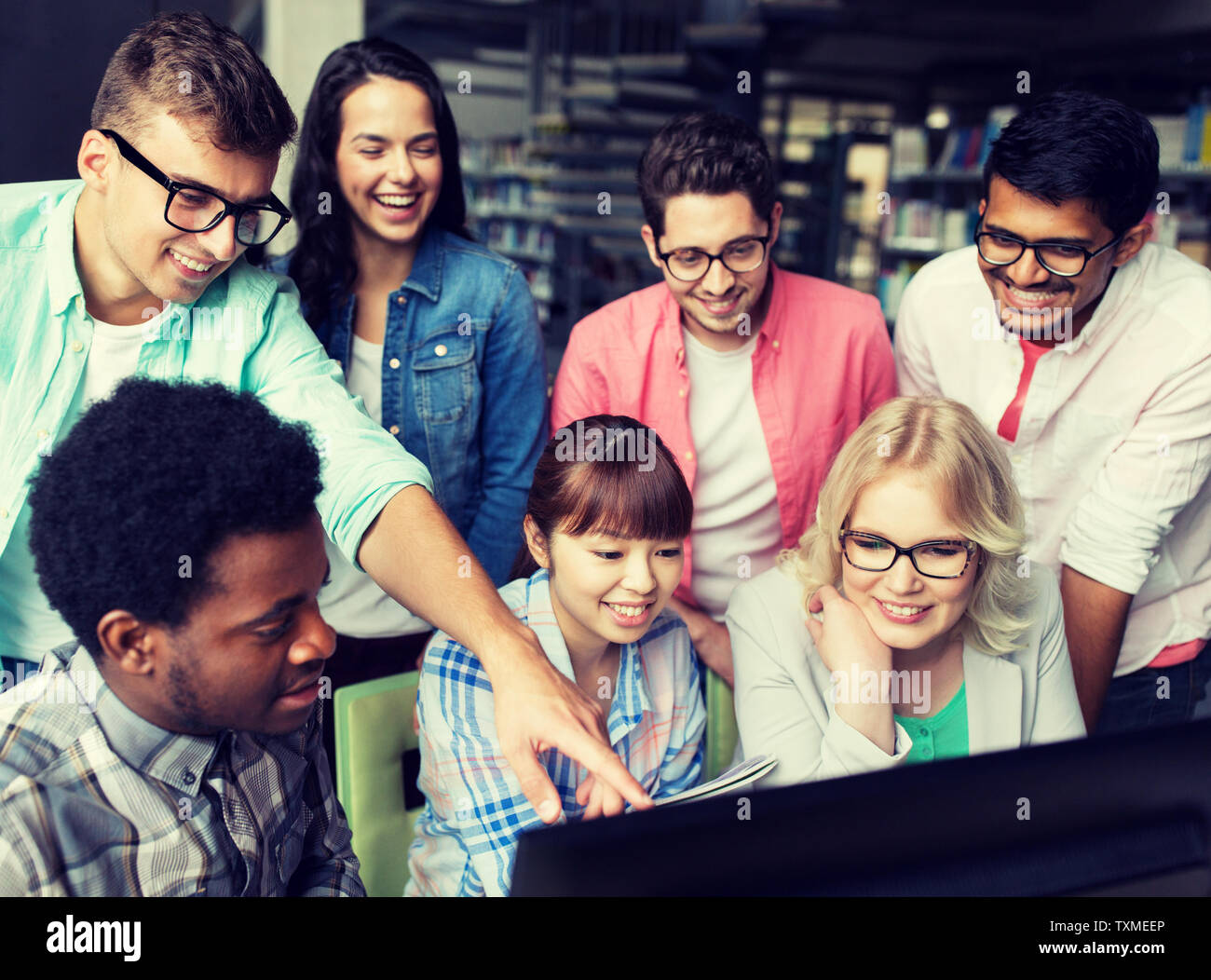 international students with computers at library Stock Photo - Alamy
