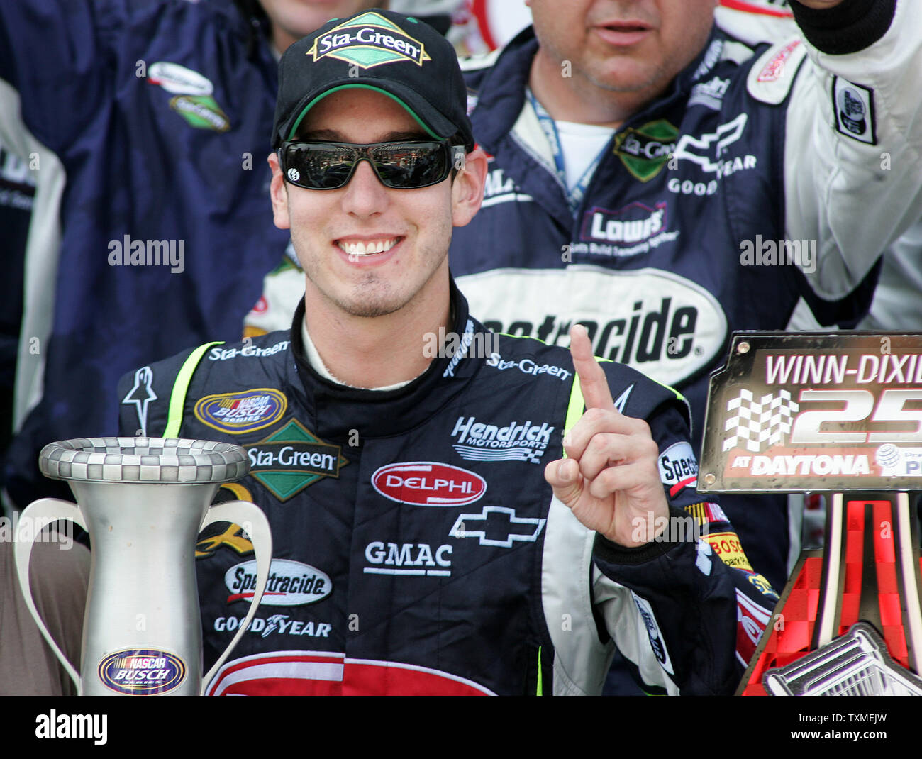 Kyle Busch celebrates in victory lane after winning the NASCAR Busch ...