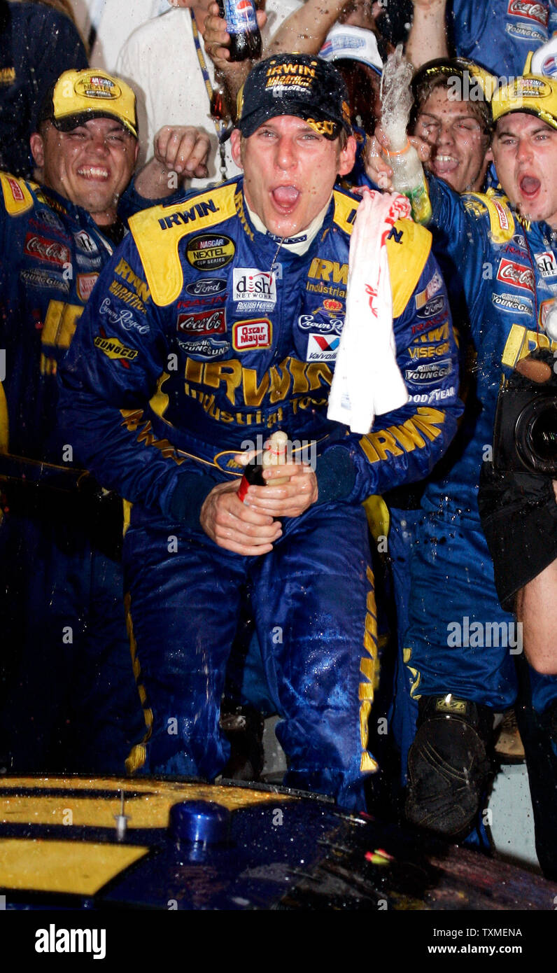 Jamie McMurray celebrates in Victory Lane after winning the NASCAR ...