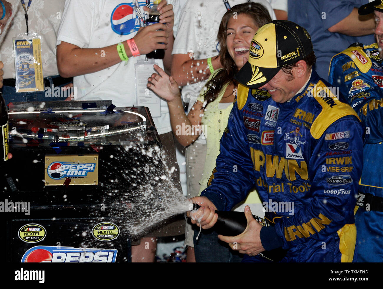 Jamie McMurray celebrates in Victory Lane after winning the NASCAR ...