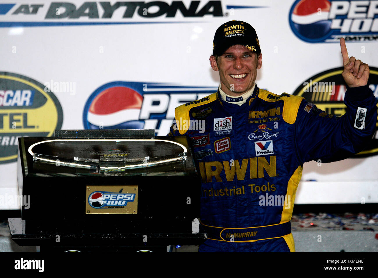 Jamie McMurray celebrates in Victory Lane after winning the NASCAR ...