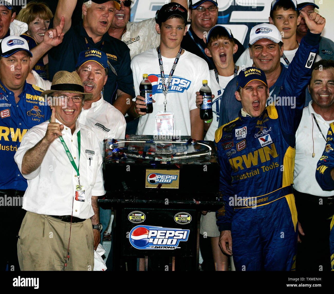 Jamie McMurray (R) and car owner Jack Roush celebrate in Victory Lane ...