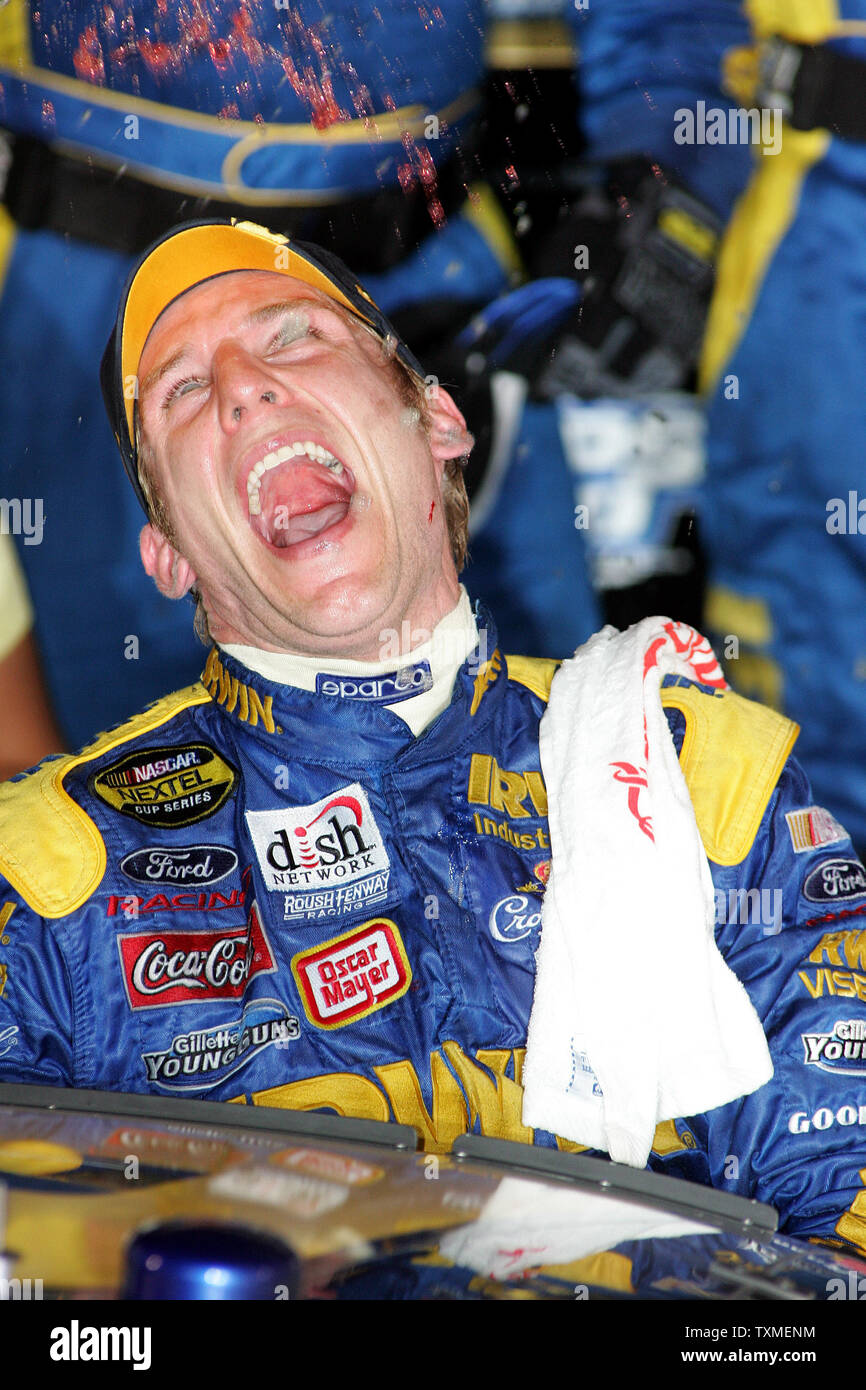 Jamie McMurray celebrates in Victory Lane after winning the NASCAR ...