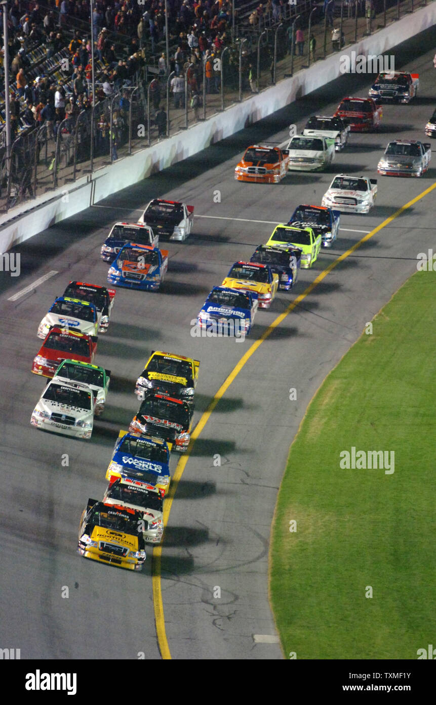 Erik Darnell (99) leads the field through the trioval during the NASCAR ...