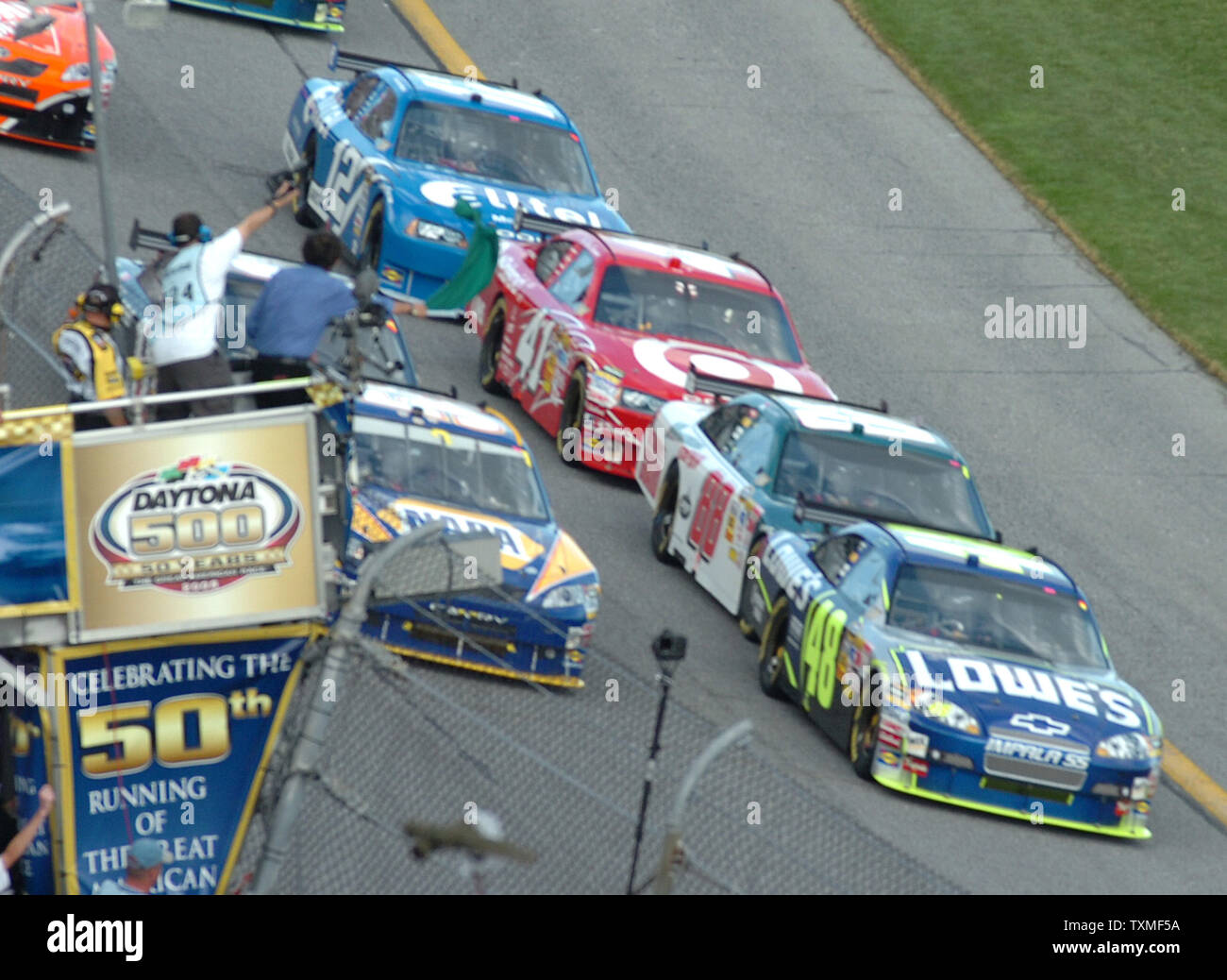 Jimmie Johnson (48) takes the green flag to start the 50th annual ...