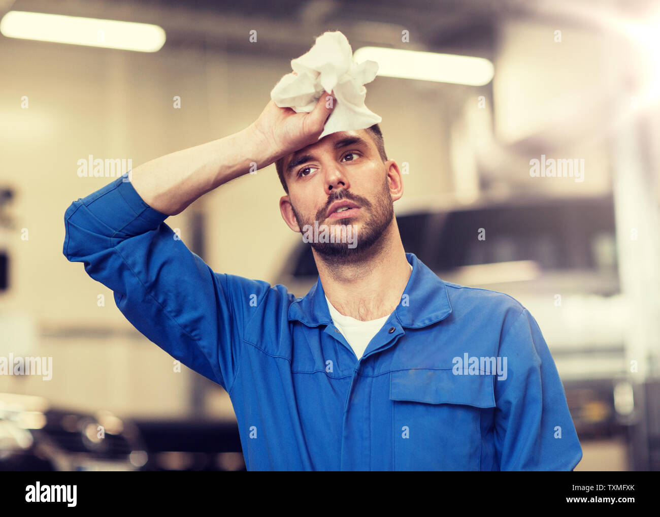 Tired car mechanic hi-res stock photography and images - Alamy