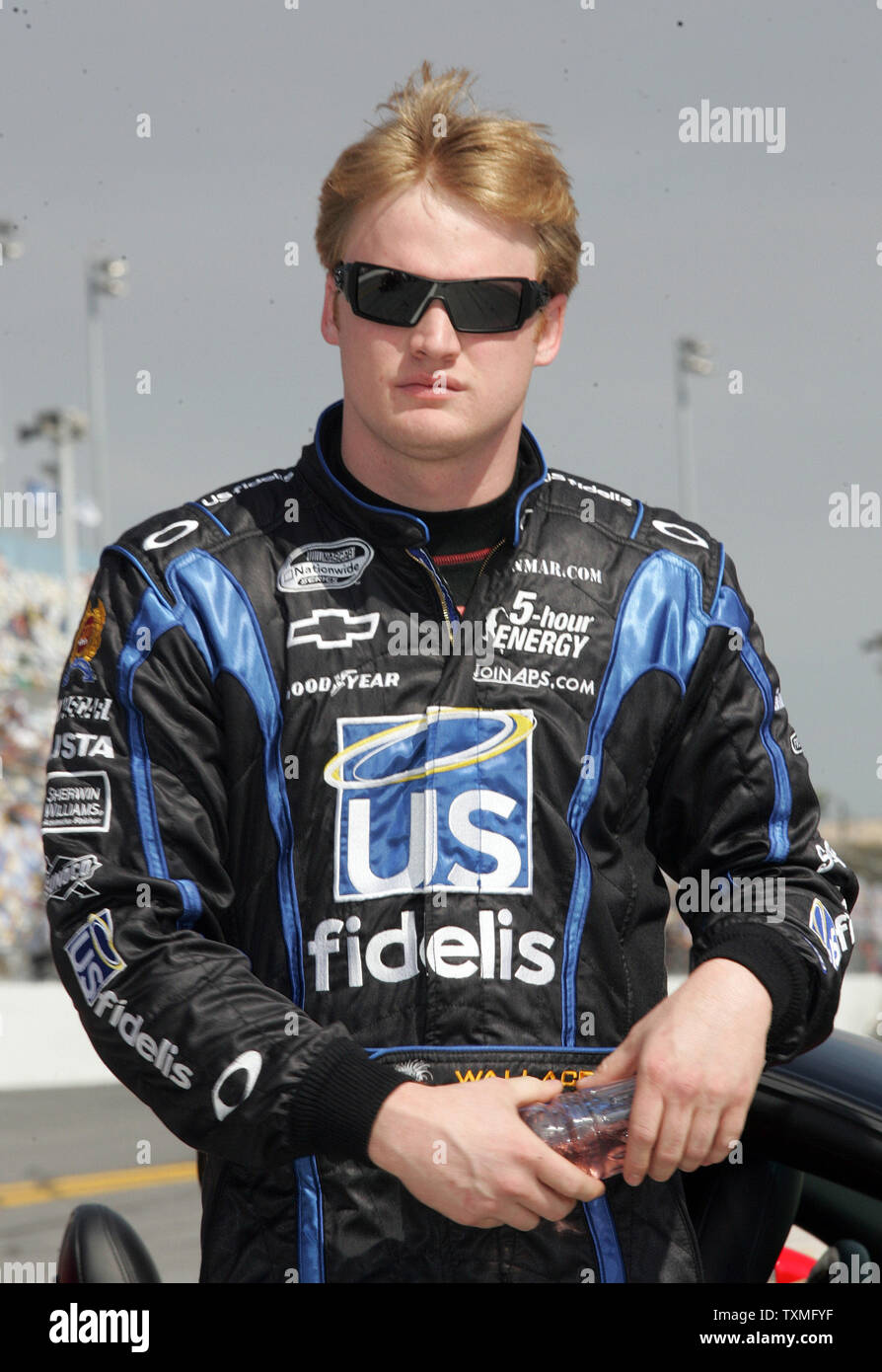Steve Wallace walks to his car on pit road prior to the start of the ...