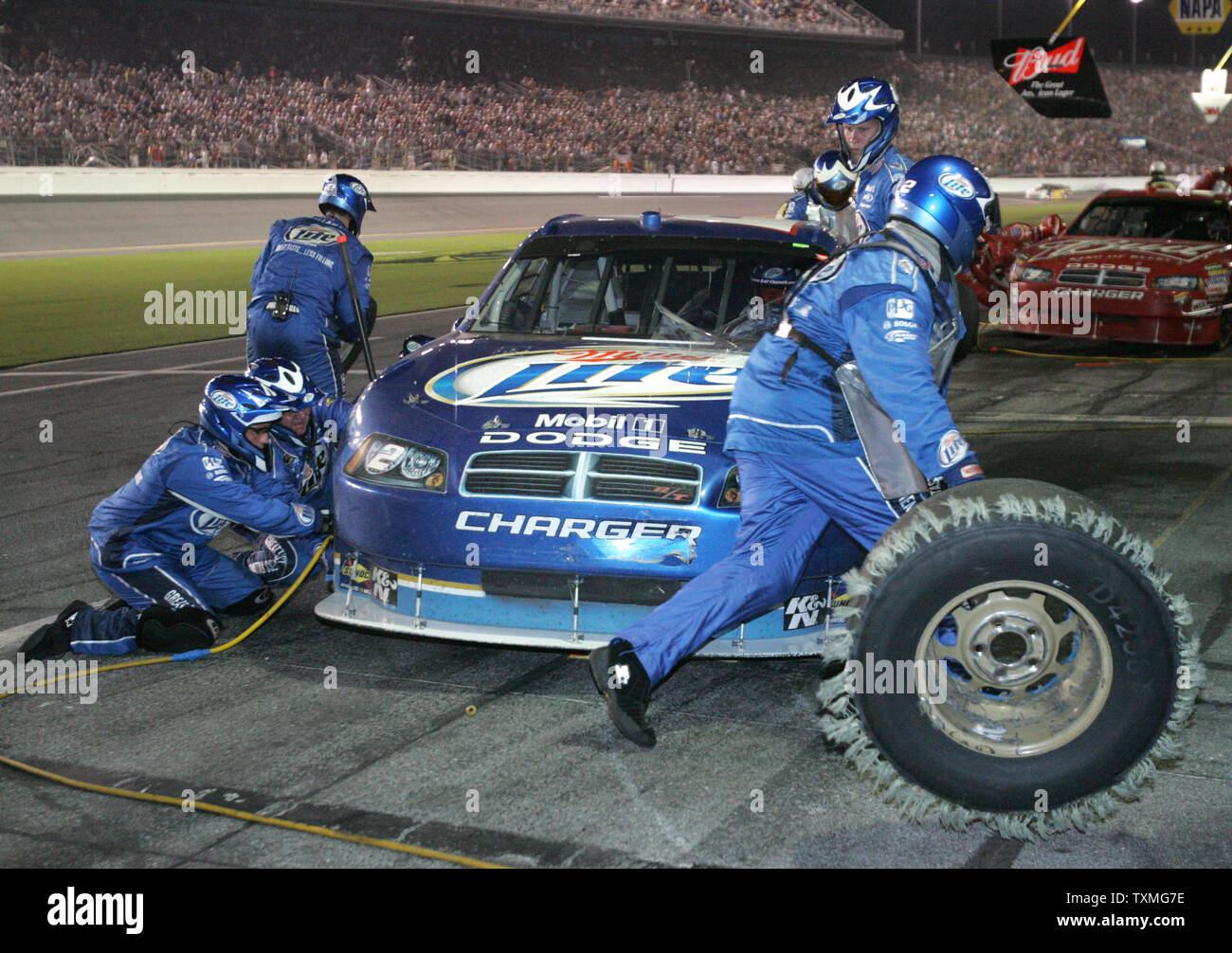 Kurt Busch pits his car in late race action during the NASCAR Coke Zero ...