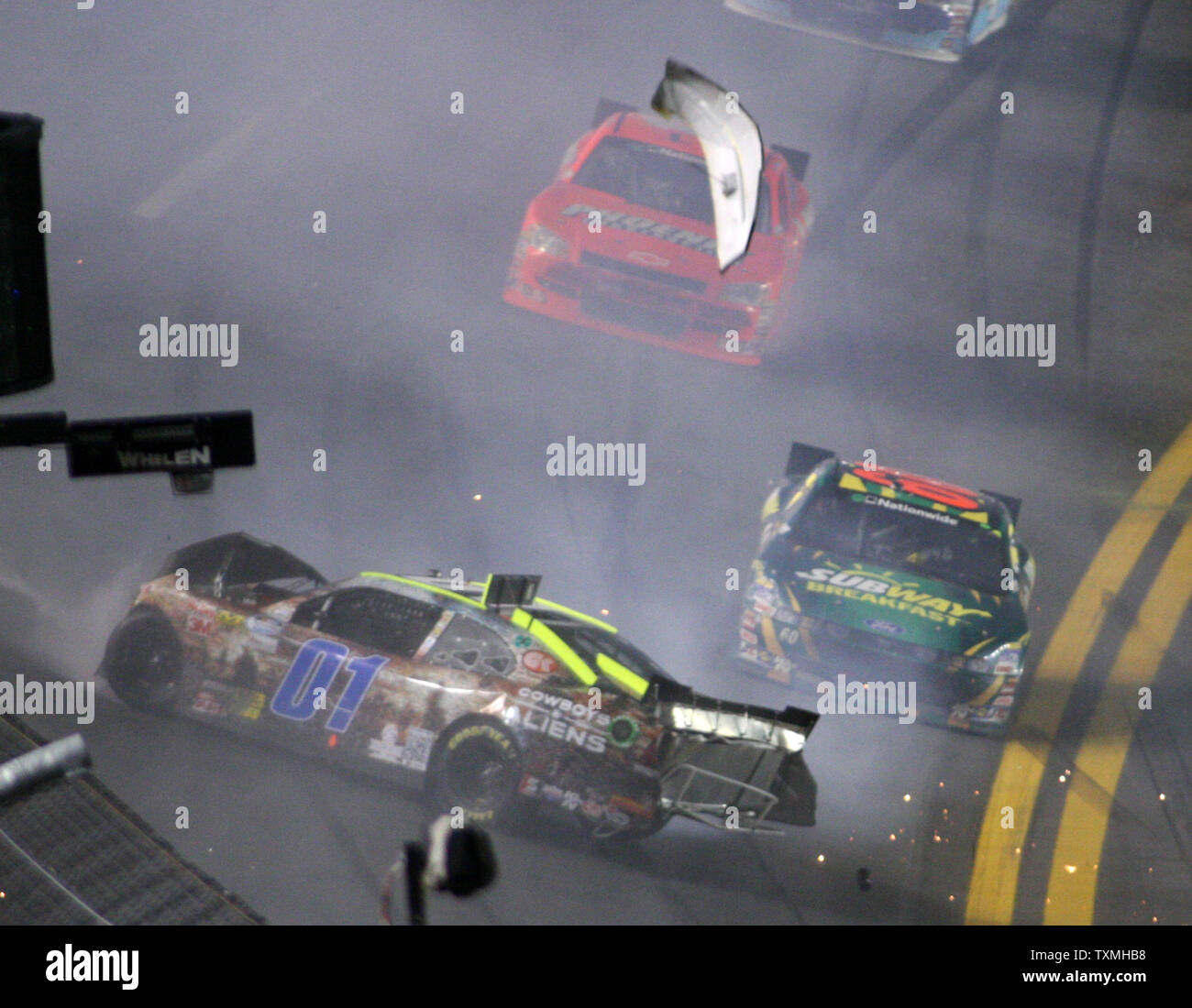 Mike Wallace (01) spins out in front of Carl Edwards (60) and Jame ...