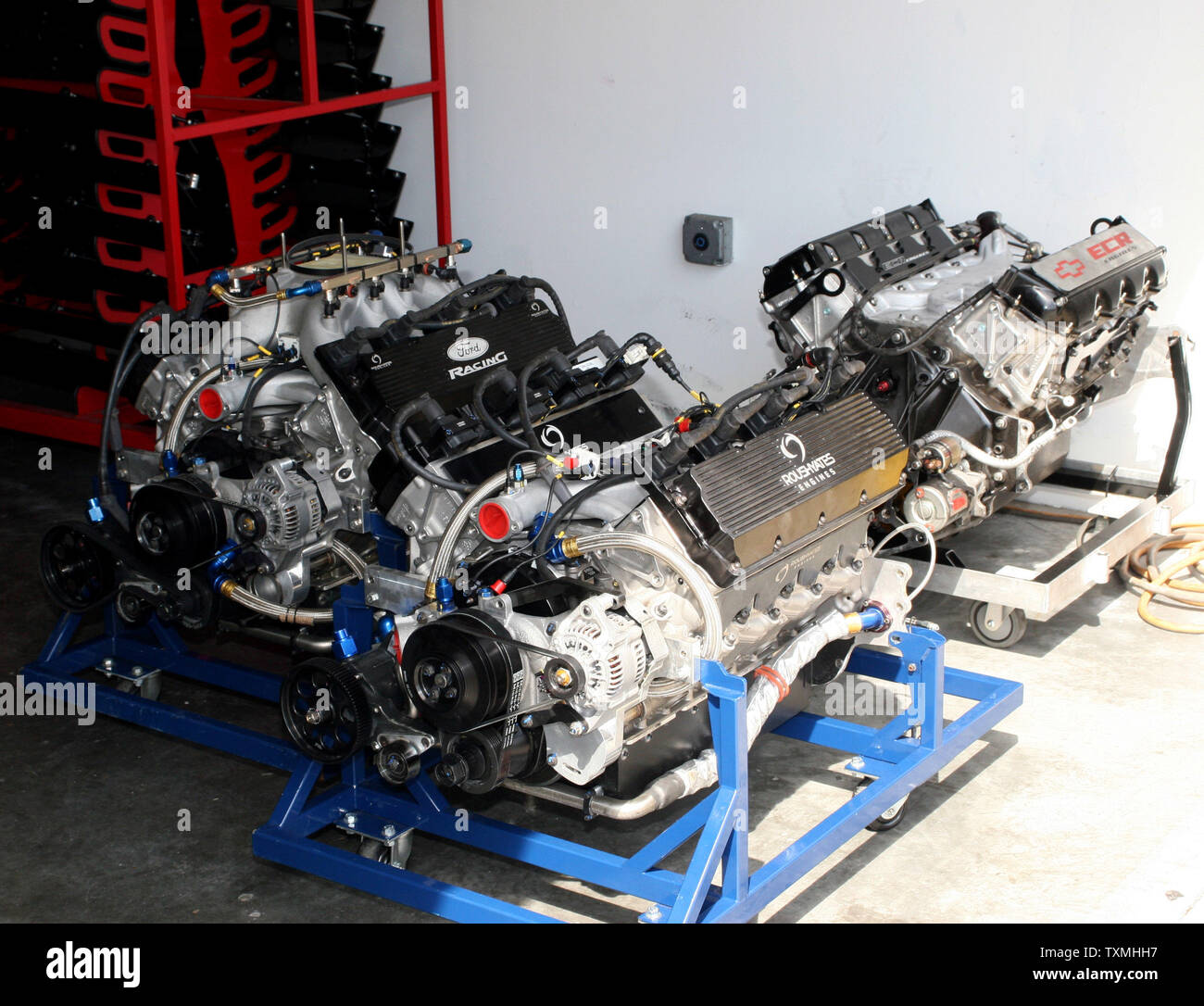 Three motors sit in NASCAR inspection prior to practice at Daytona ...