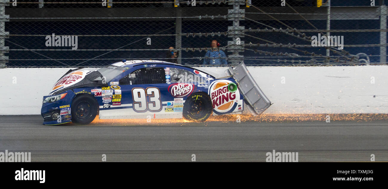 Travis Kvapil, in his #93 Burger King Toyota, hits the wall in the back ...