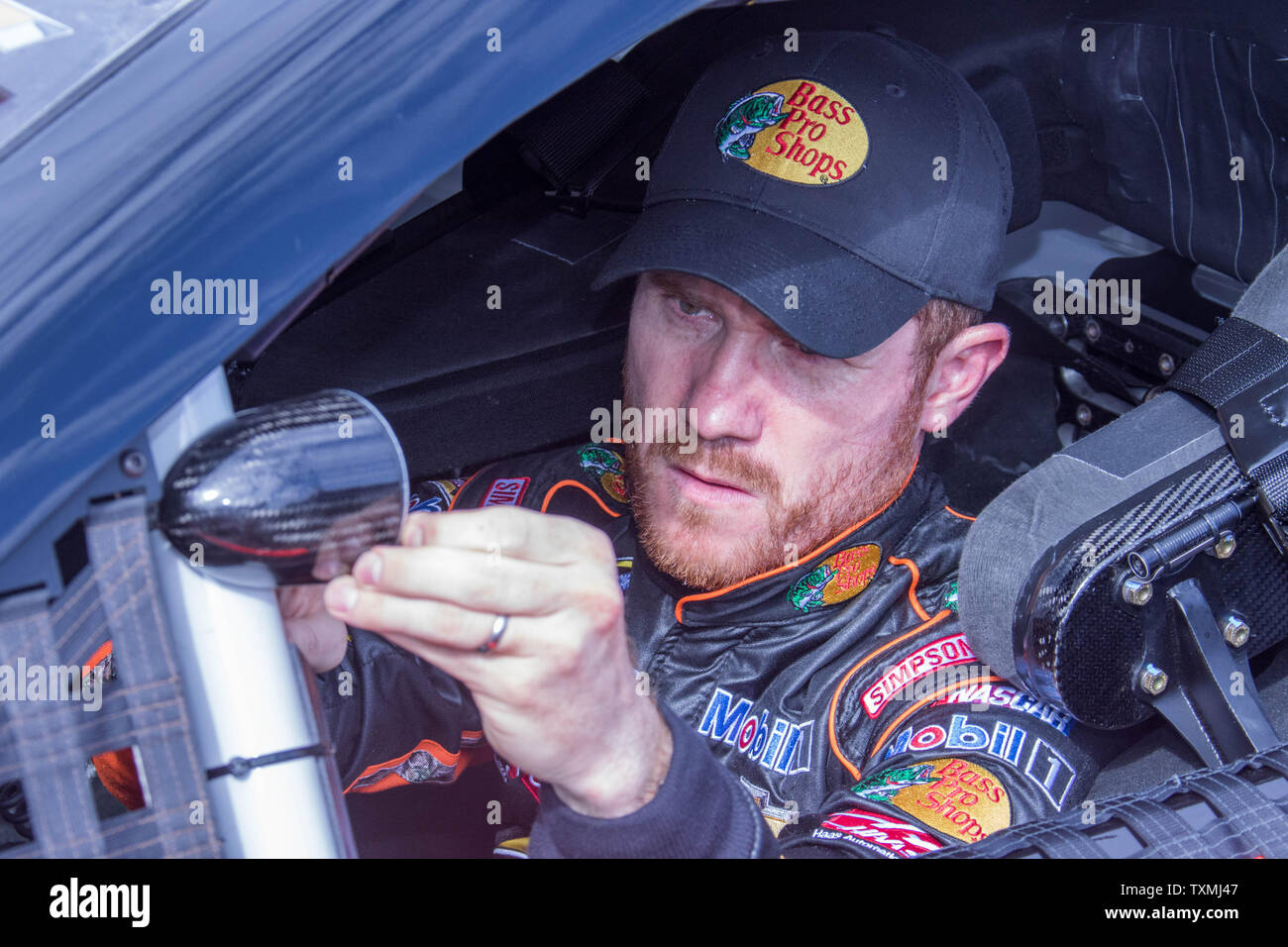 Brian Vickers, who is subbing for the injured Tony Stewart, adjusts his ...