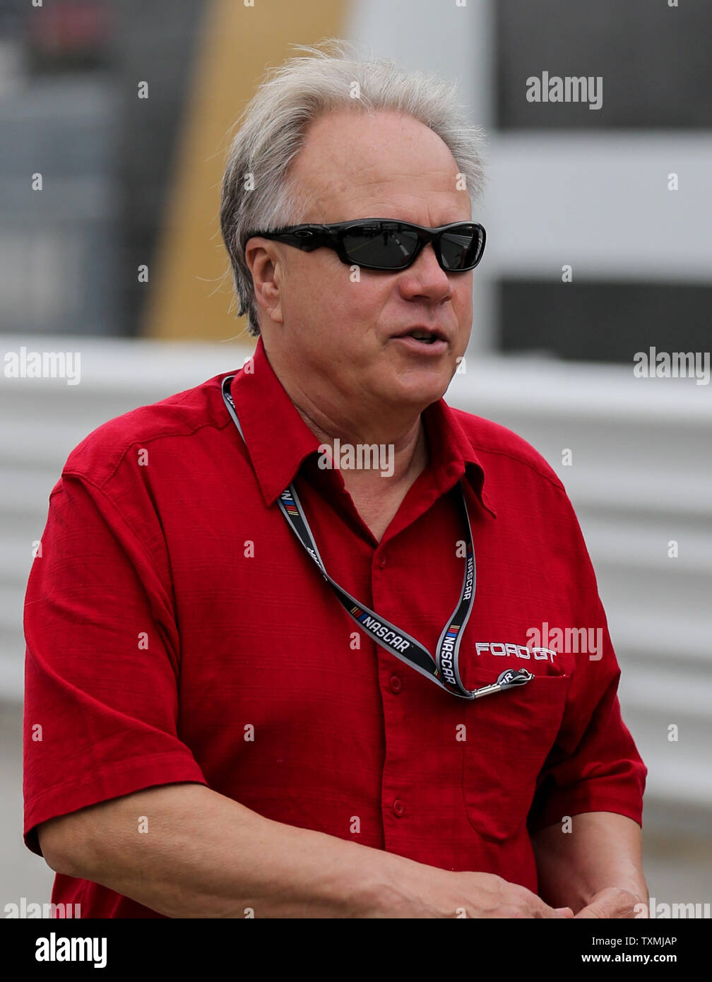NASCAR and Formula One Team Owner Gene Haas walks through the pits ...
