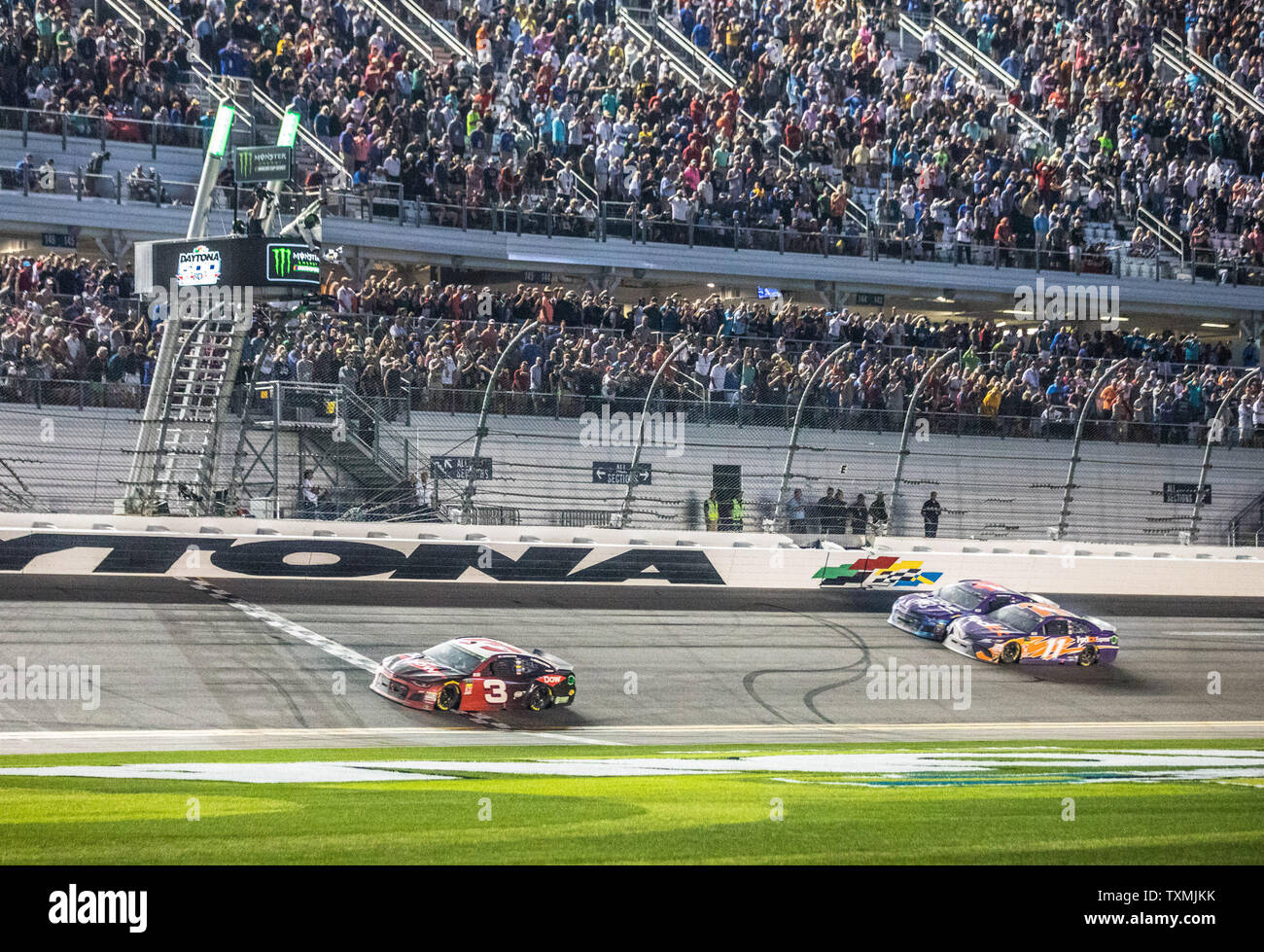 Austin Dillon takes the checkered flag to win the 60th Daytona 500 at ...