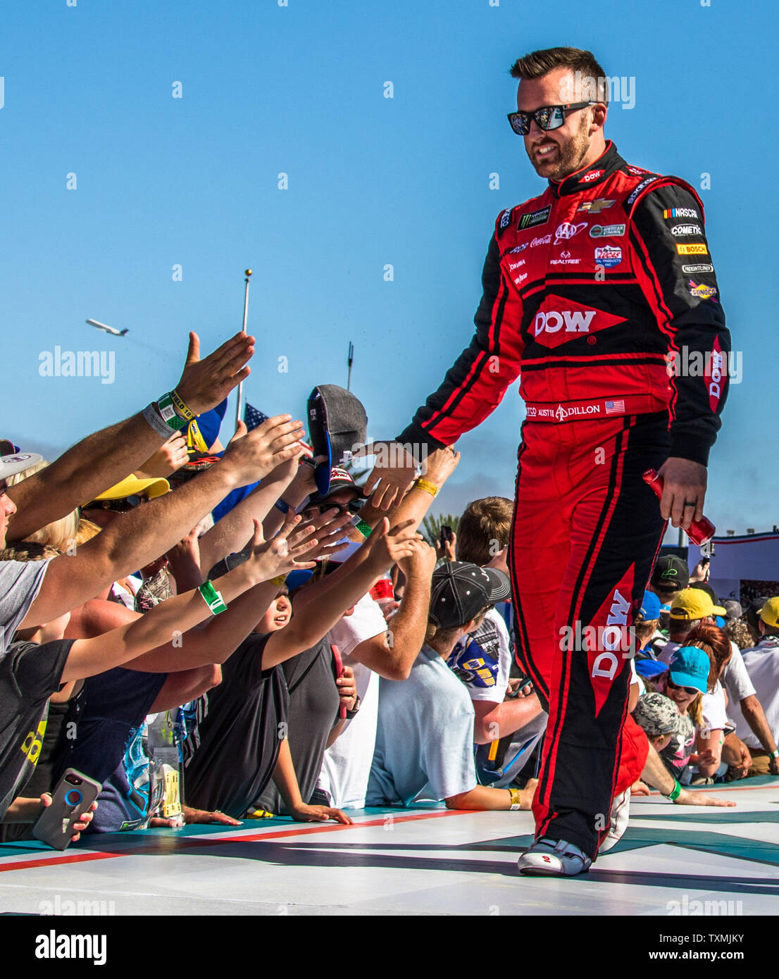 Eventual Winner Austin Dillon salutes fans during introductions prior ...