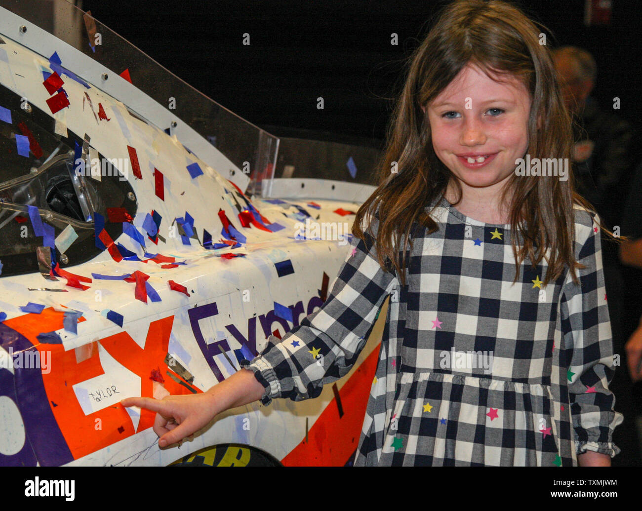 Taylor Hamlin signs daddy's, Denny Hamlin, car after he won the 2019 ...