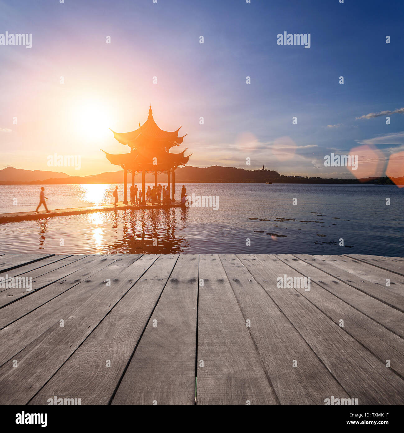 ancient pavilion in hangzhou with sunset glow Stock Photo - Alamy
