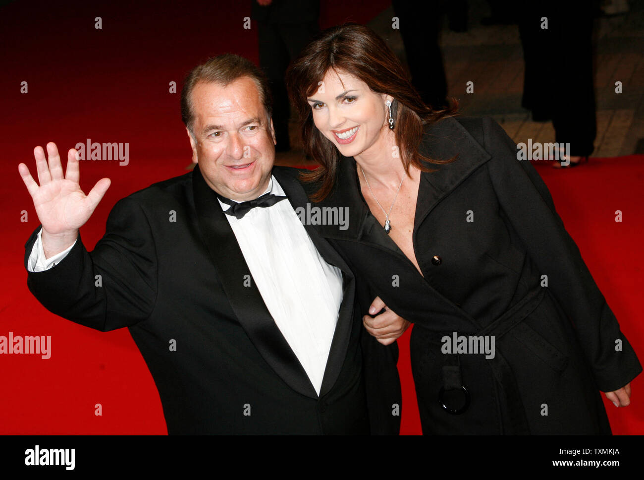 French personality Paul-Loup Sulitzer (L) and French actress Caroline ...