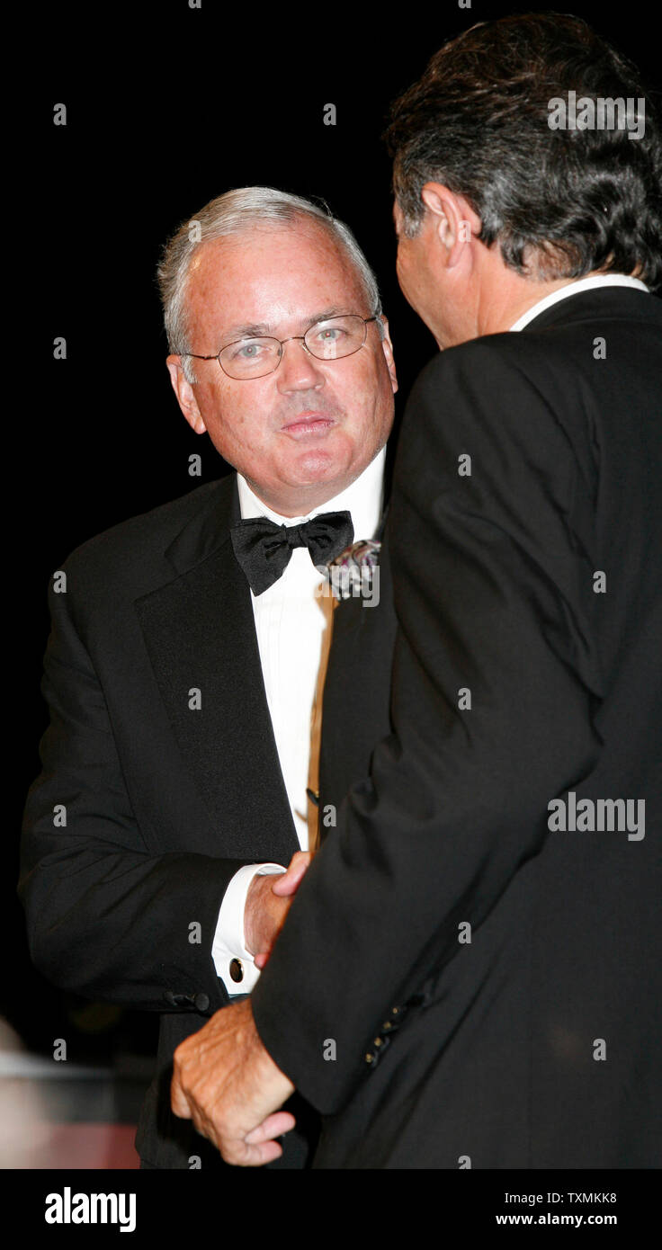 American Ambassador to France Craig Roberts Stapleton shakes hands with ...