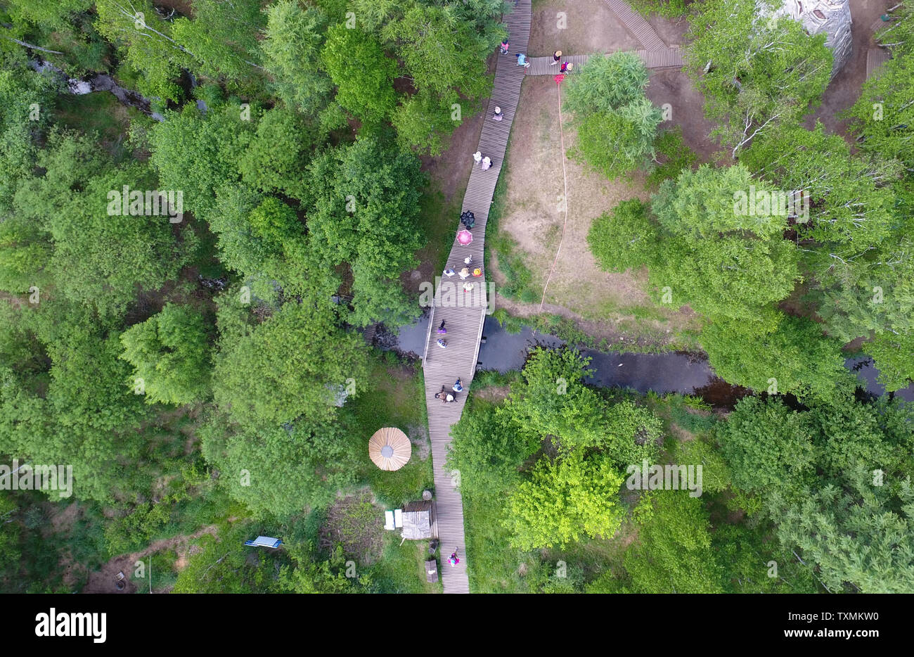 Genhe. 25th June, 2019. Aerial photo taken on June 25, 2019 shows ...