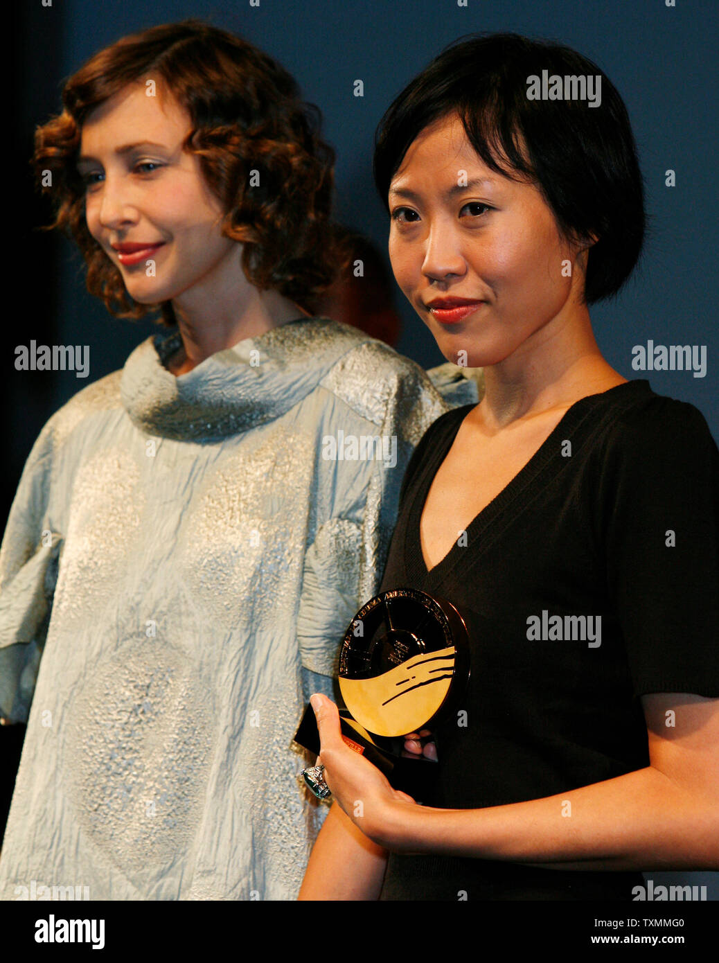 Director Gina Kim (R) and actress Vera Farmiga receive the Jury Prize ...