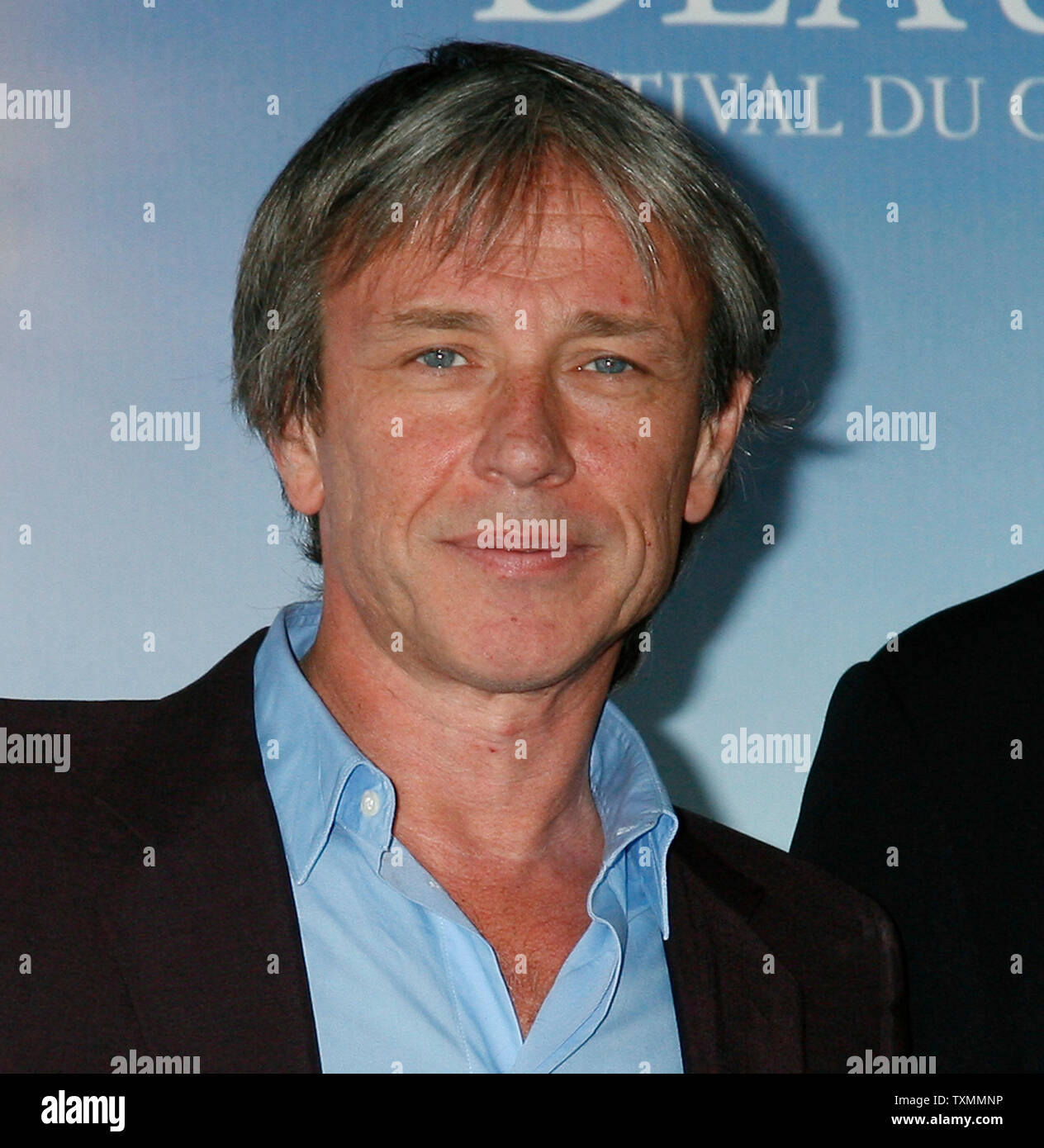 Director Damian Harris arrives at a photocall for the film "Gardens of ...