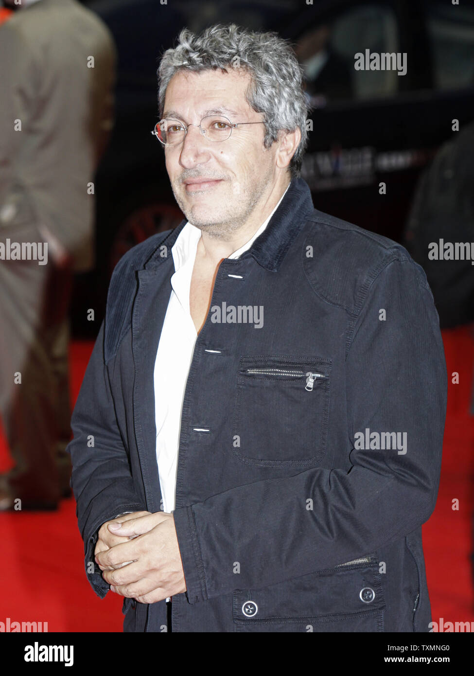 Actor Alain Chabat arrives on the red carpet before a screening of the ...