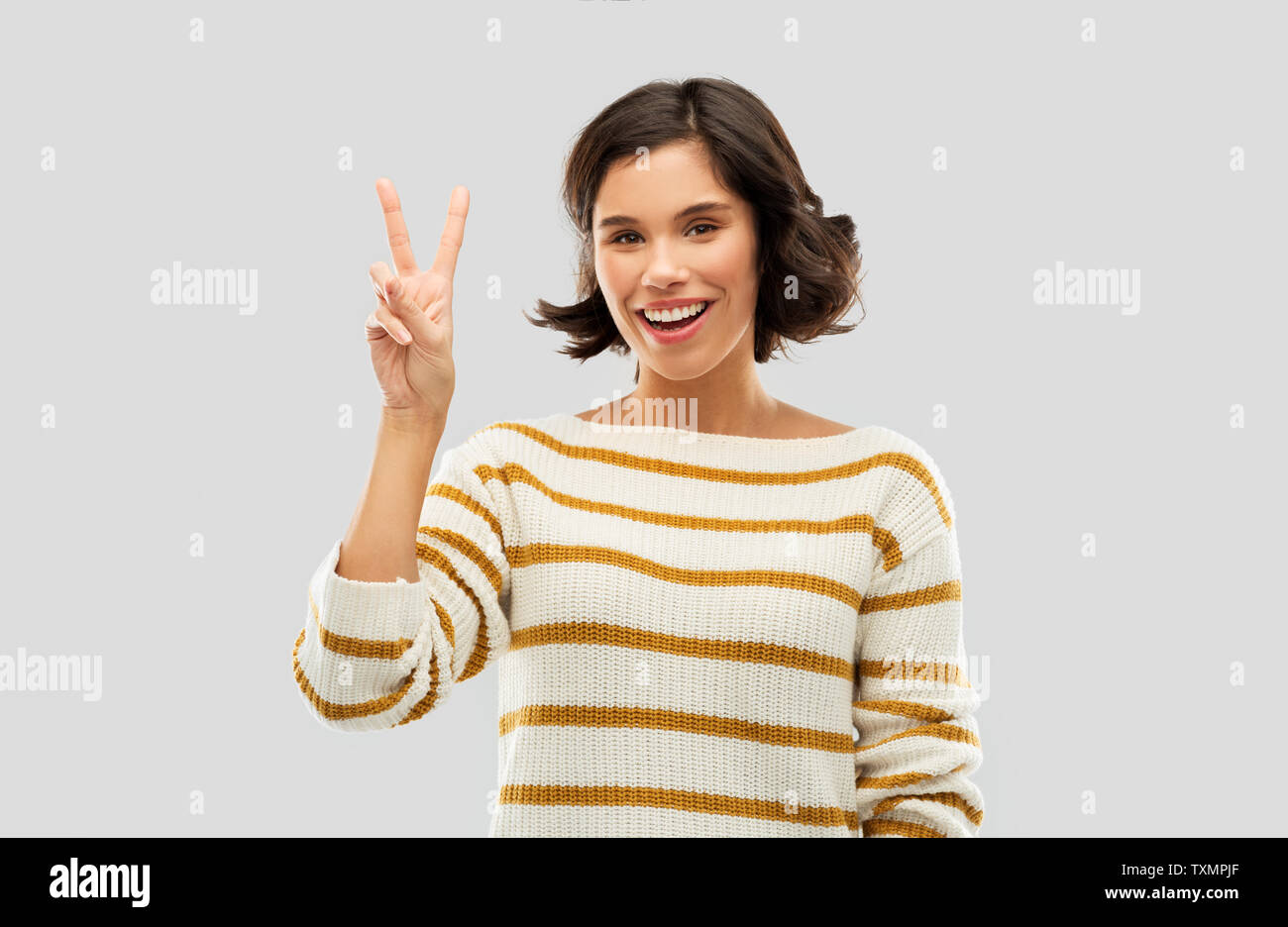 Peace sign hand showing two hi-res stock photography and images - Alamy