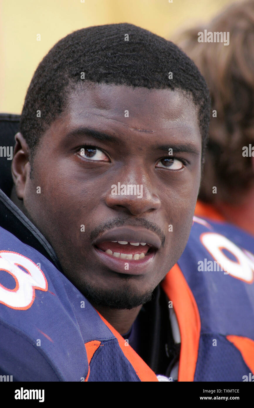 Denver Broncos defensive end Courtney Brown watches scoreboard against ...