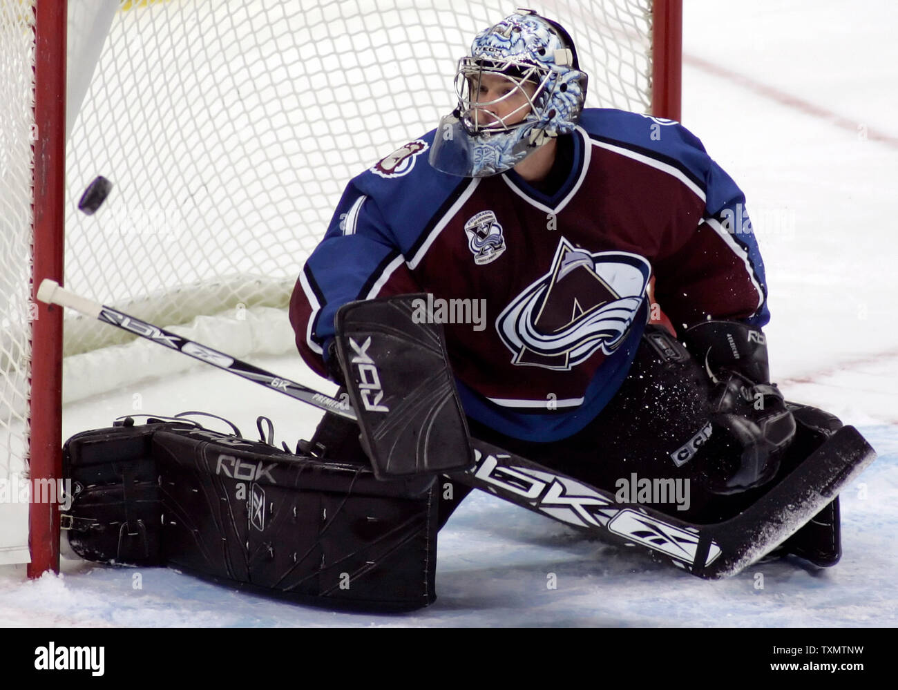 Colorado Avalanche goalie David Aebischer makes a save against the ...