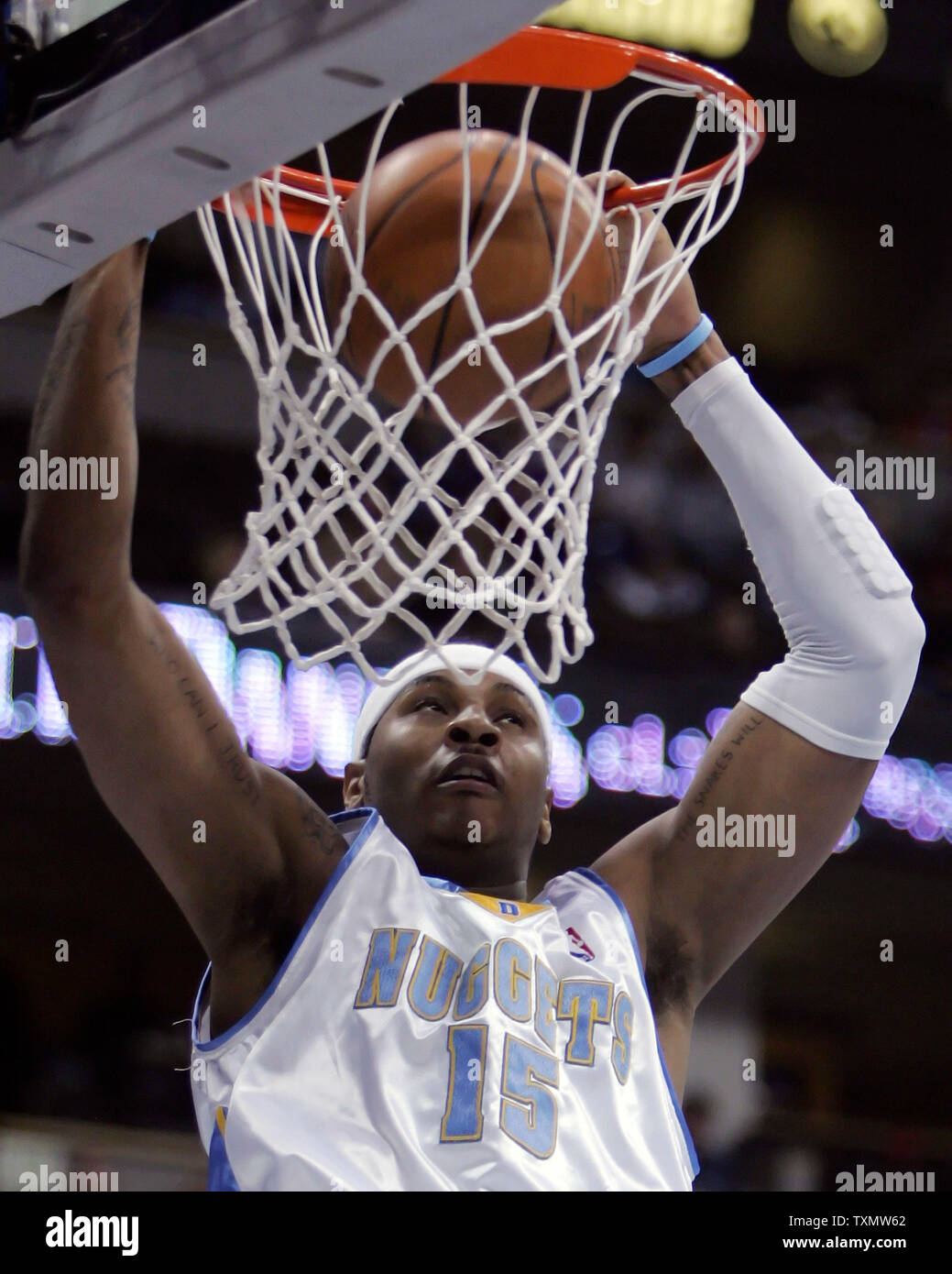 Denver Nuggets forward Carmelo Anthony dunks against the Phoenix Suns ...
