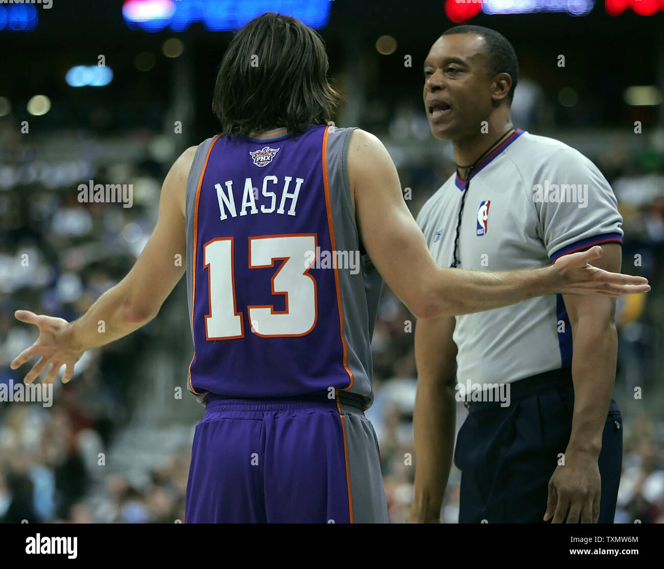 Phoenix Suns guard Steve Nash (L) gestures after call by referee Rodney ...