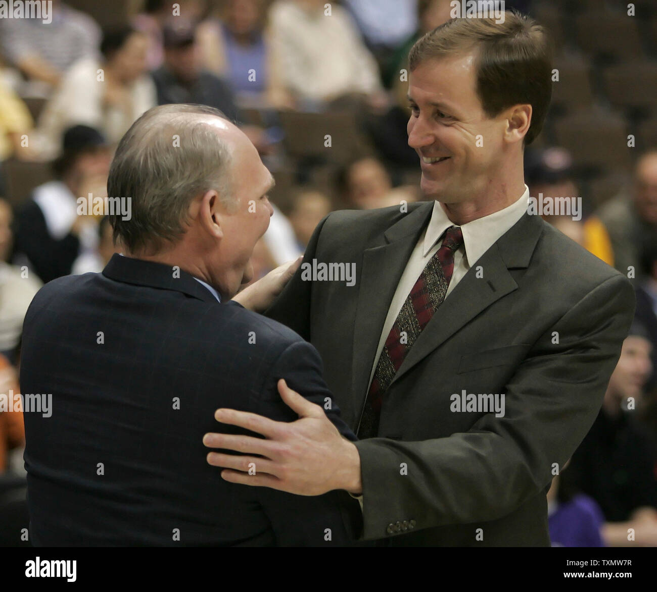 Milwaukee Bucks head coach Terry Stotts (R) greets his old coach George ...