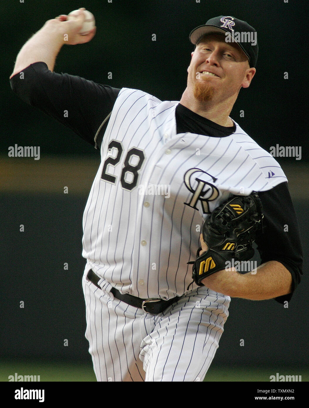 Colorado Rockies starting pitcher Aaron Cook (5-7) pitches in the first ...