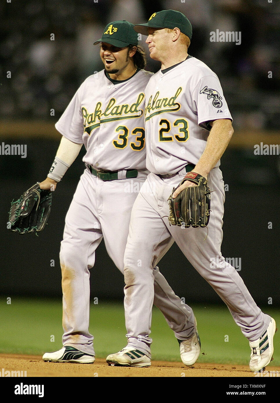 Oakland Athletics Nick Swisher (L) and Bobby Kielty (R) walk off the ...