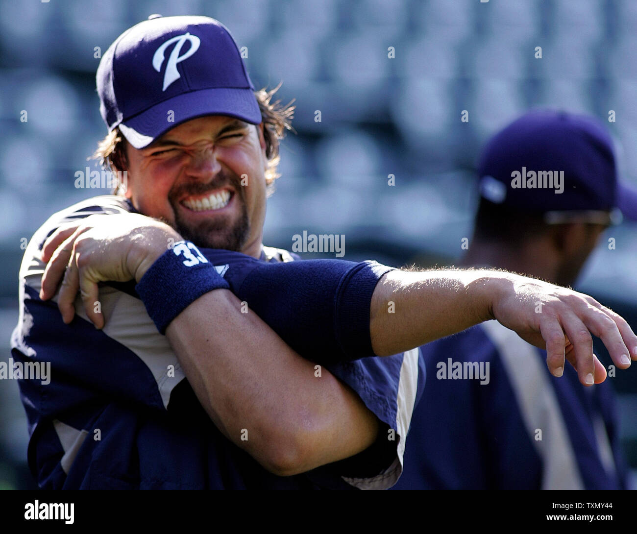 San Diego Padres catcher Mike Piazza stretches prior to game against ...