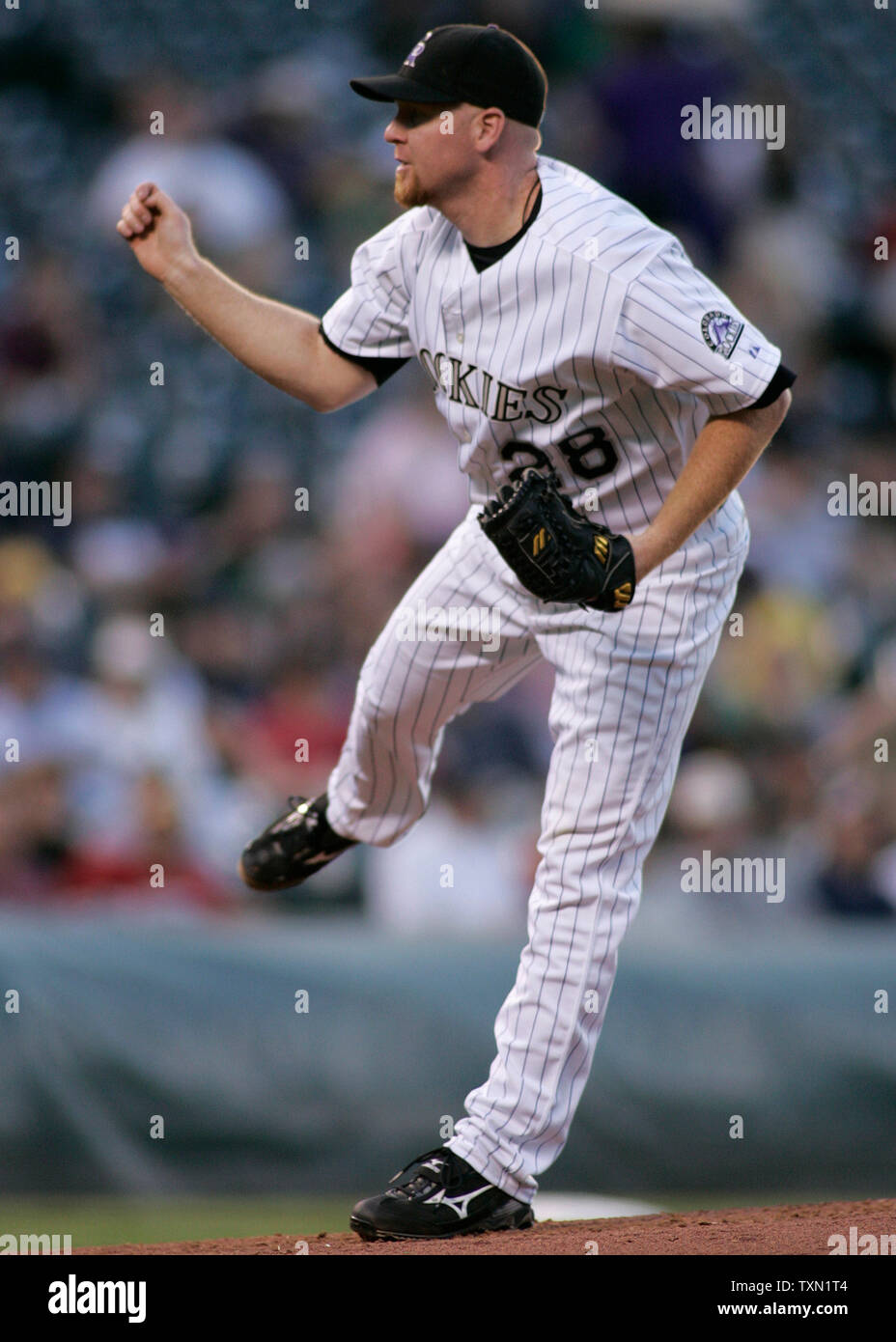 Colorado Rockies starting pitcher Aaron Cook earned a 5-3 win over the ...