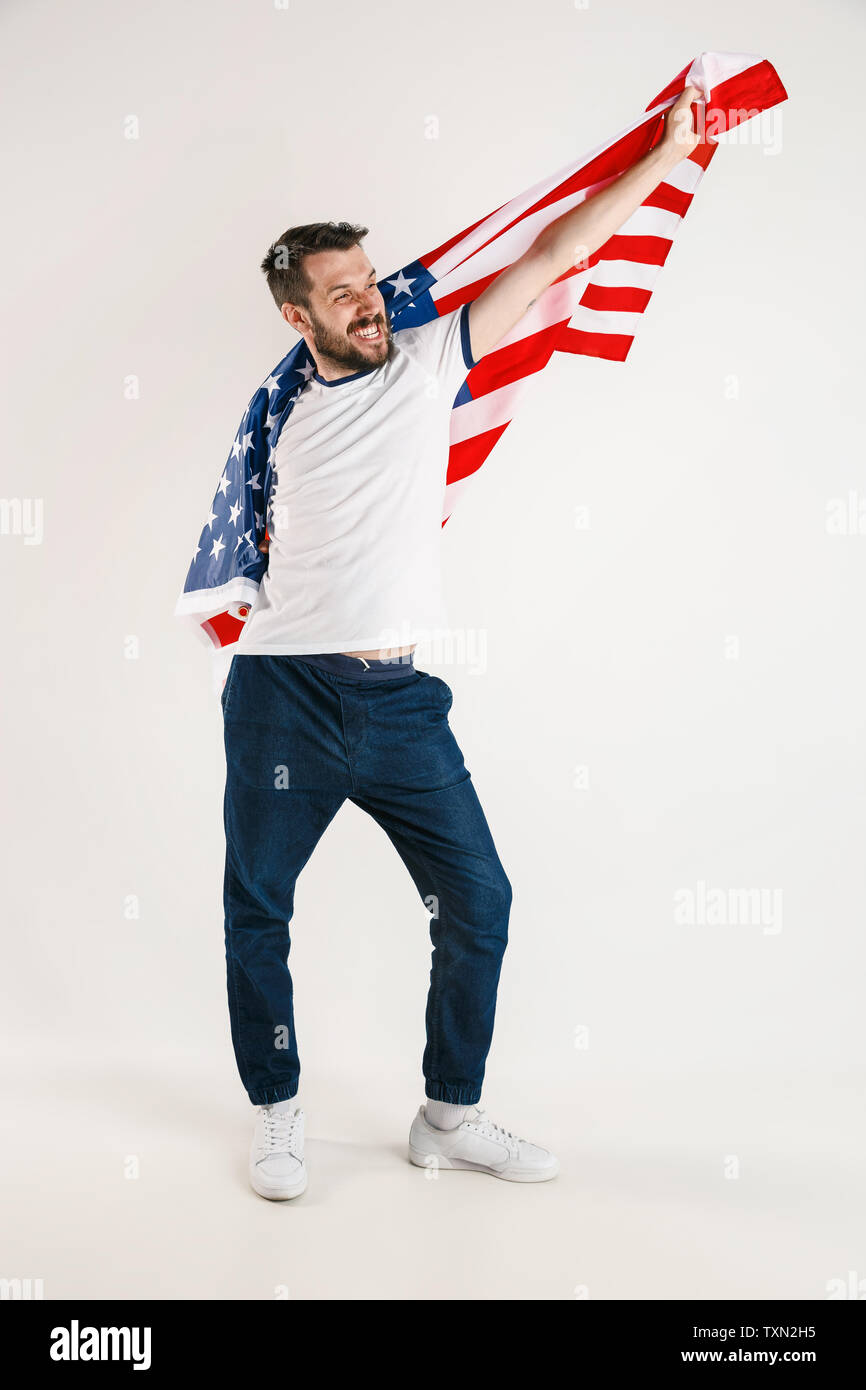 Celebrating an Independence day. Stars and Stripes. Young man with the ...