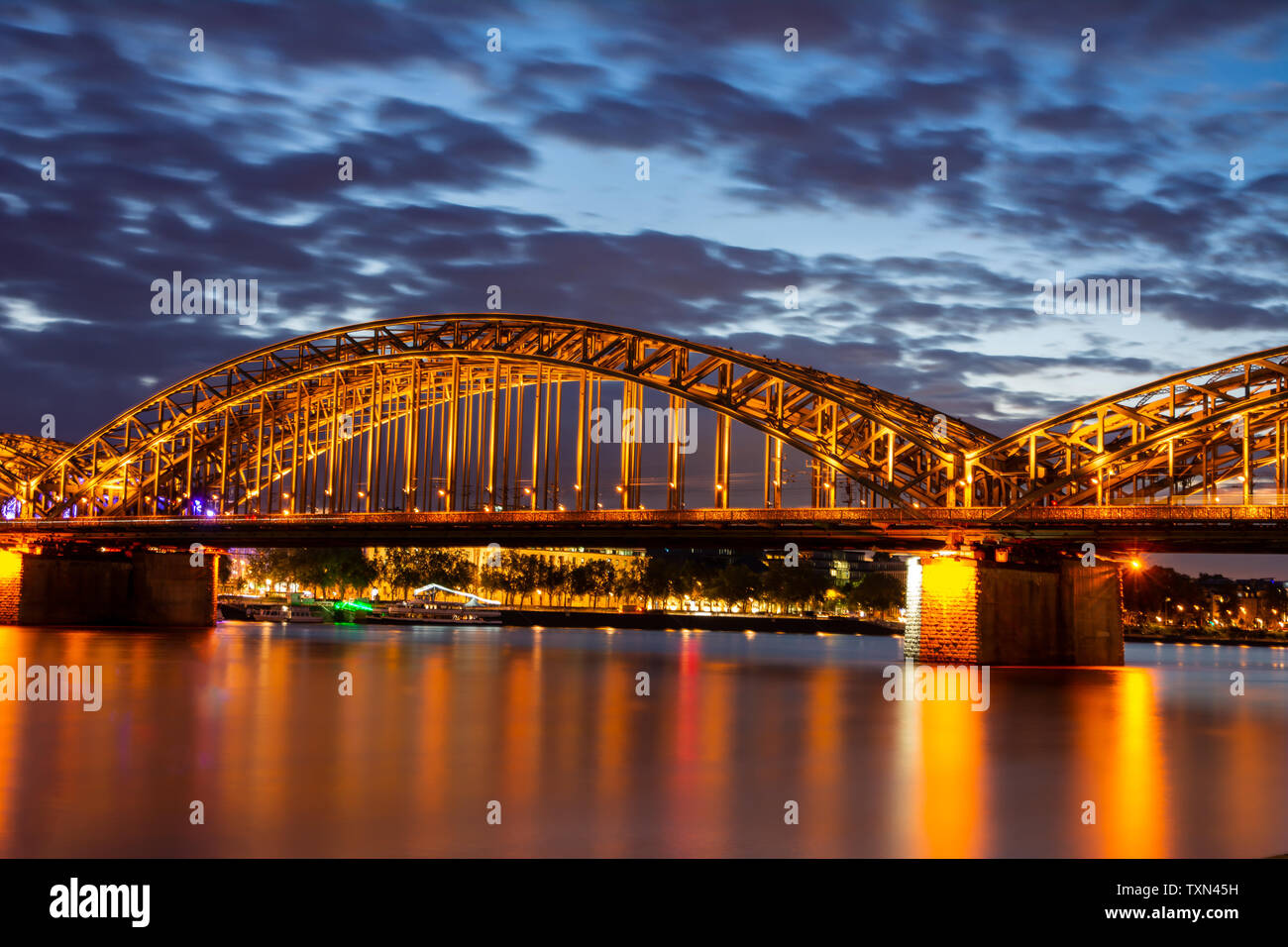 Night at the illuminated Hohenzollern Bridge in Cologne Stock Photo - Alamy