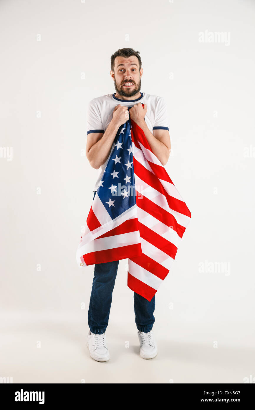 Celebrating an Independence day. Stars and Stripes. Young man with the ...
