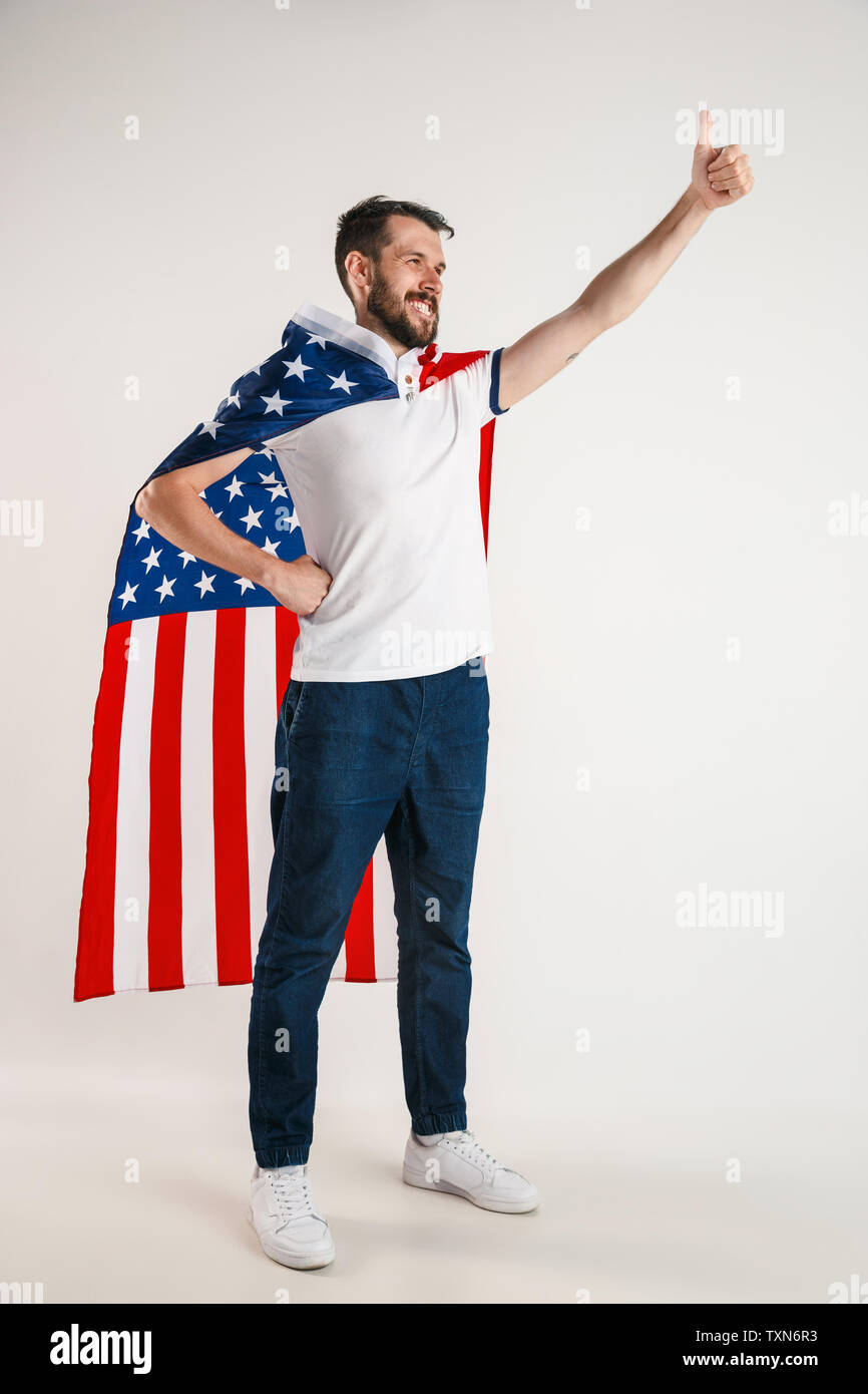 Celebrating an Independence day. Stars and Stripes. Young man with the ...